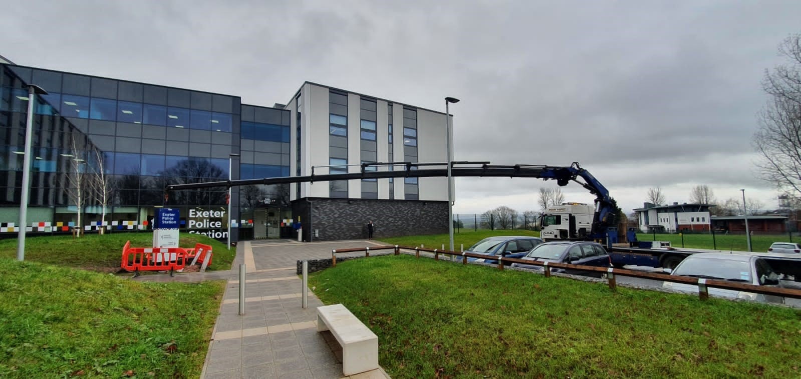 Hiab installation of new signage for Exeter Police Station - LCS Transport