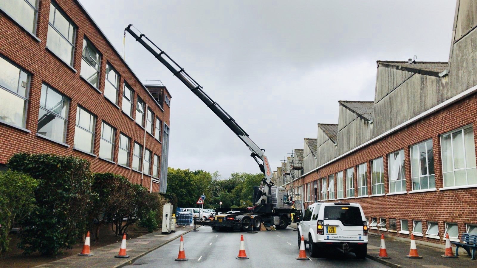 HiAb removal of air-con units from 3 story building - LCS Transport